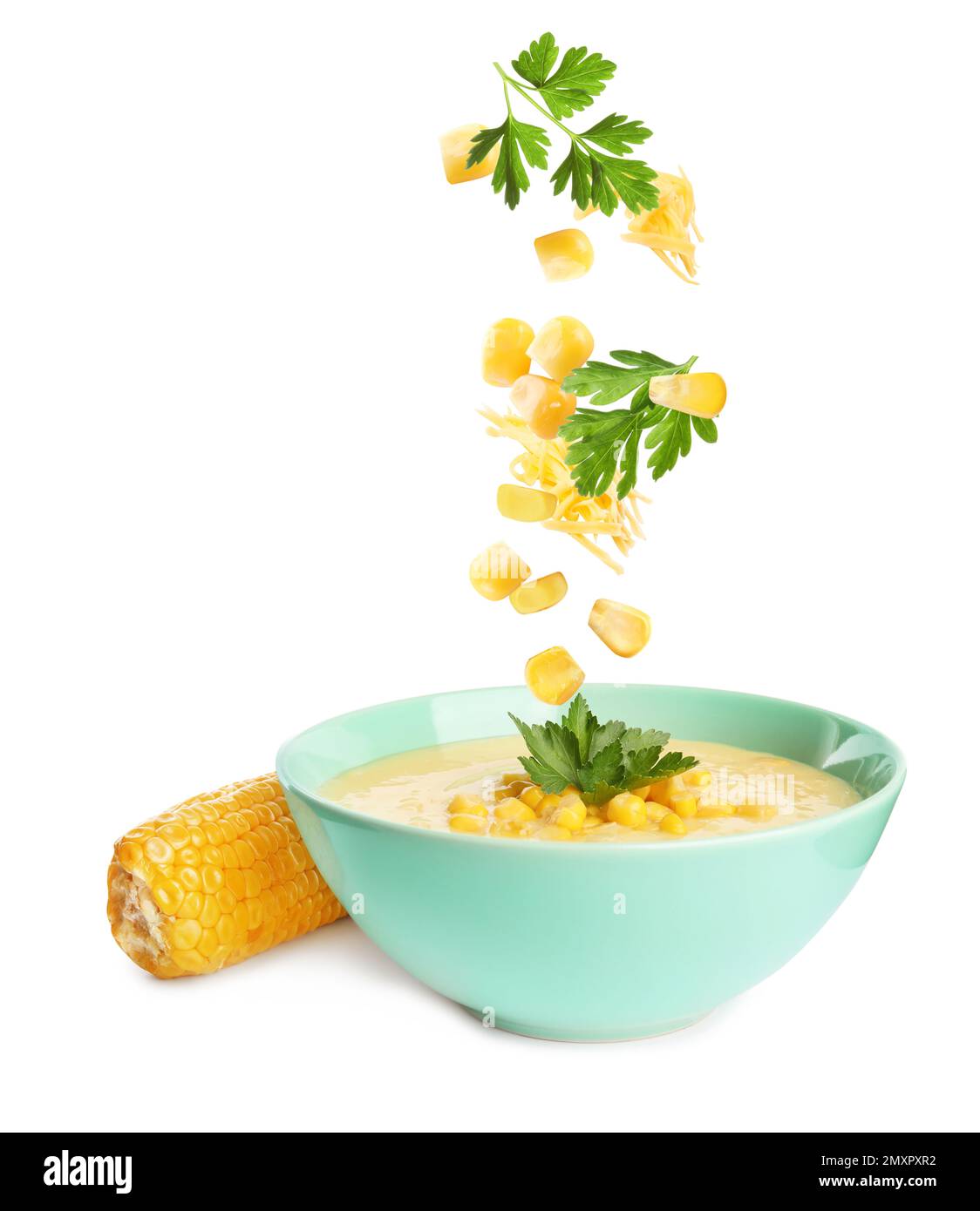 Collage with ingredients falling into bowl of corn soup on white ...