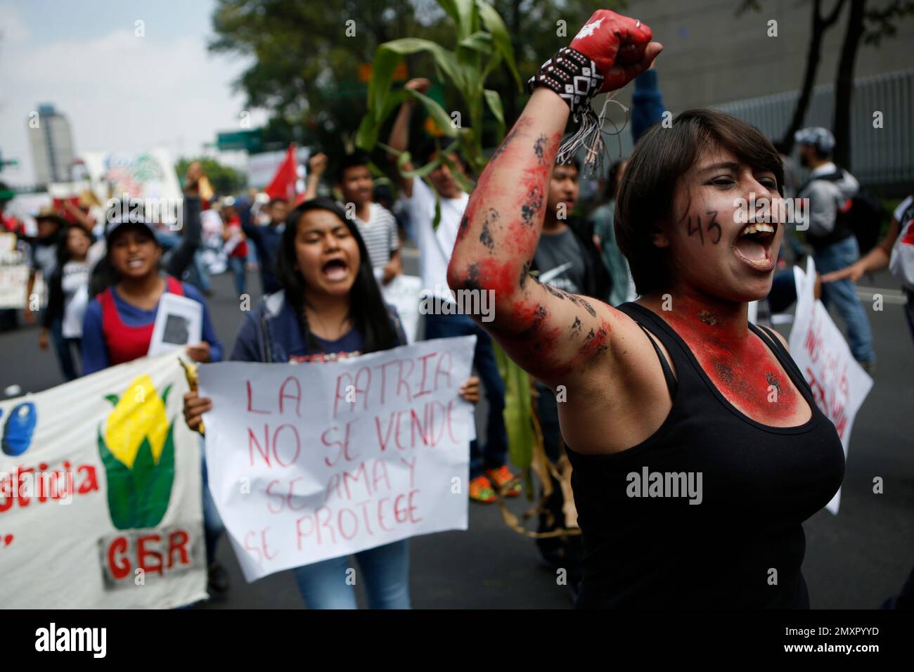 Protestors chant during a march commemorating the anniversary of the ...