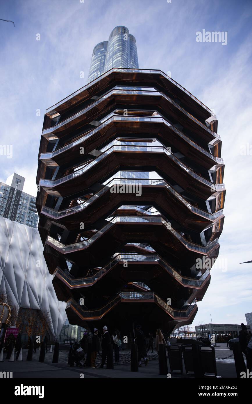 A vertical shot of the exterior of the modern Vessel building in New ...