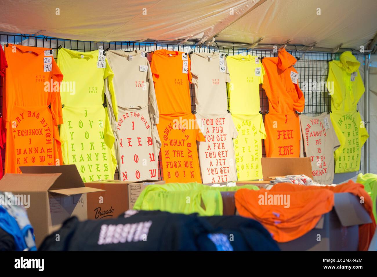A booth offers Kanye West merchandise at the 2016 The Meadows Music and ...