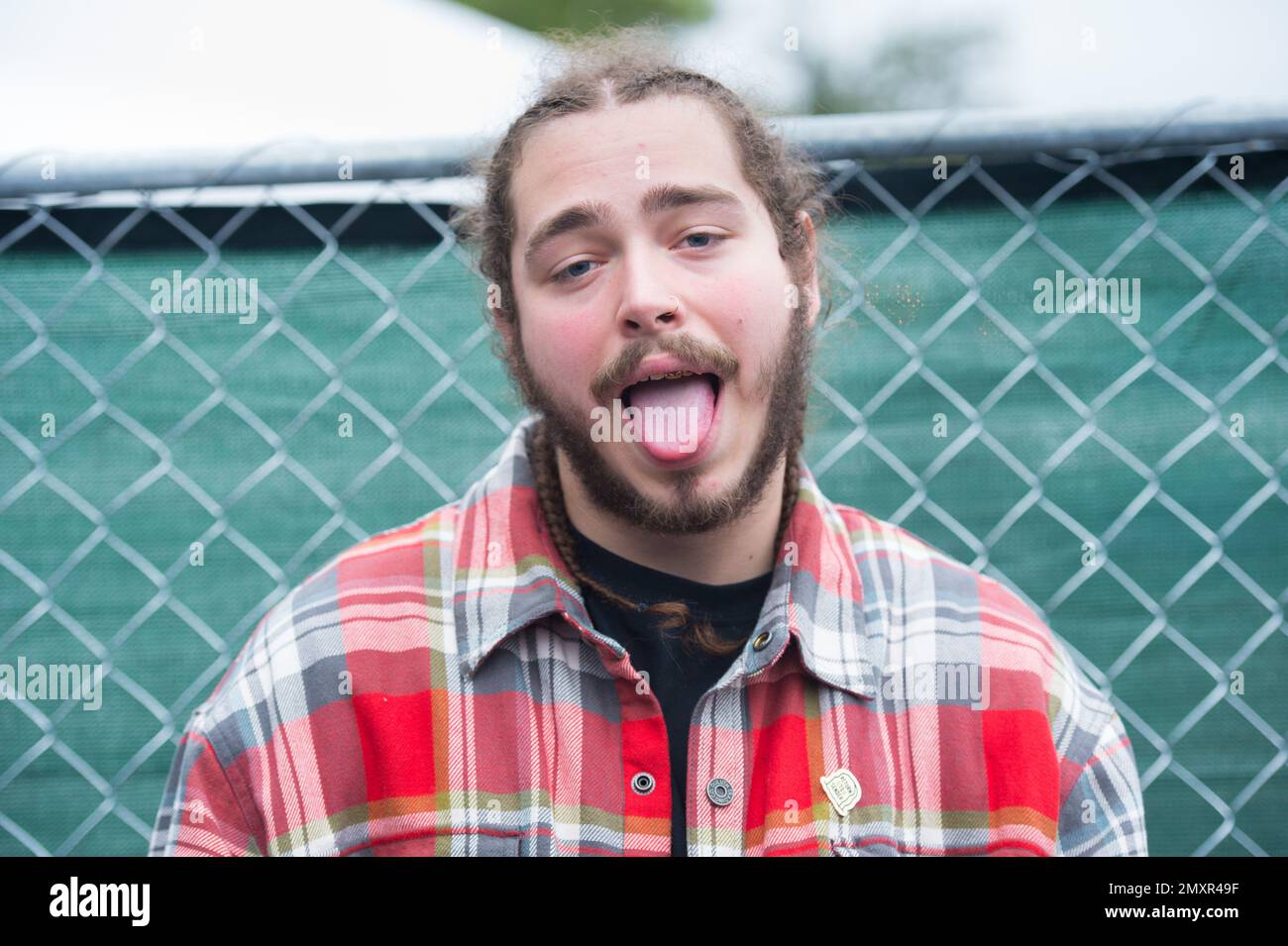Artist Post Malone poses for a photo backstage at the 2016 The Meadows ...