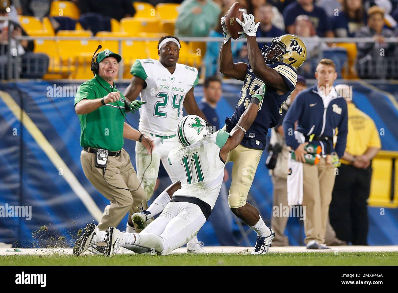 Pittsburgh wide receiver Jester Weah (85) catches a pass over Marshall ...