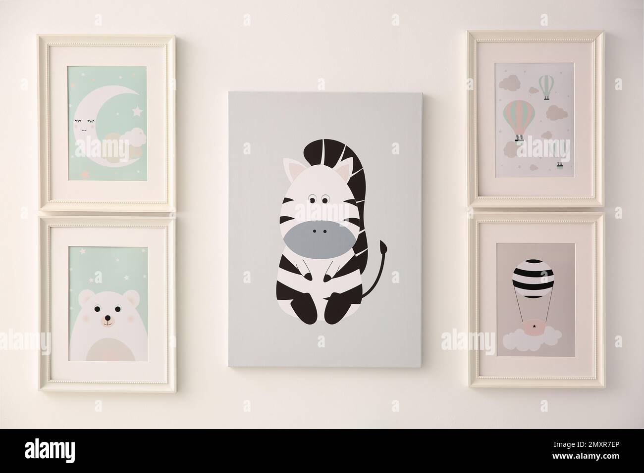 Adorable pictures on wall indoors. Interior design Stock Photo - Alamy