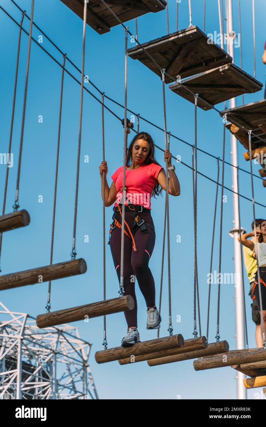 Woman handling the hardest rope level with no difficulty in an ...