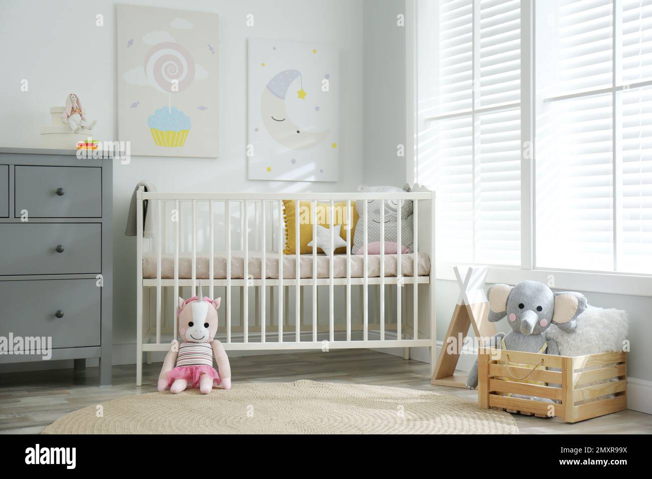Baby room interior with cute posters and crib Stock Photo - Alamy