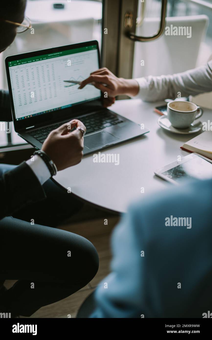 Three students conversating and discussing about their upcoming ...