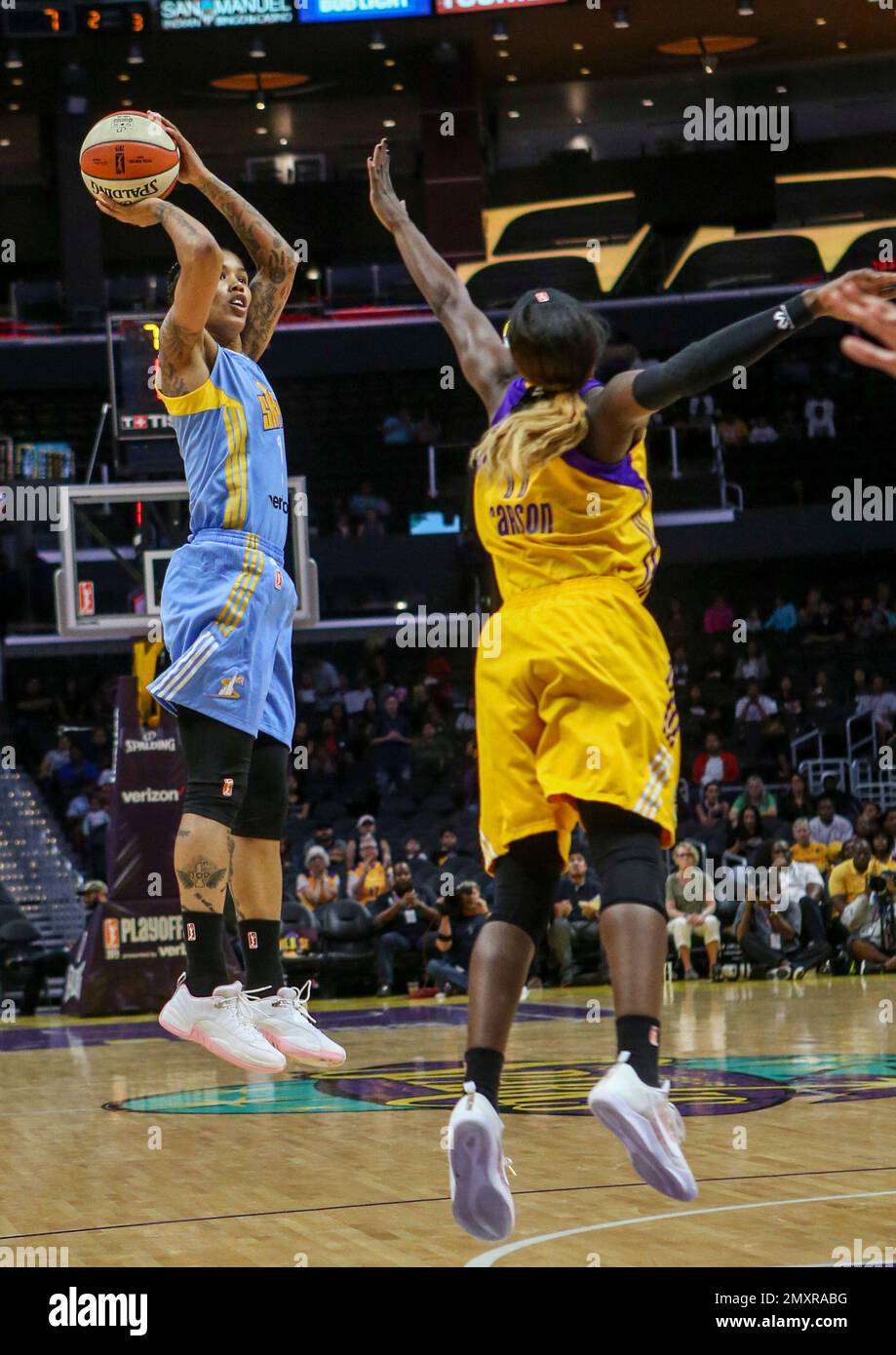 Chicago Sky forward Tamera Young, left, shoots against Los Angeles ...