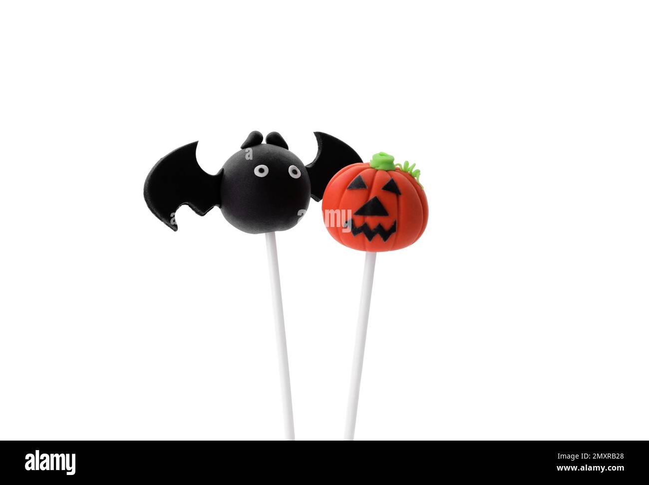 Delicious Halloween themed cake pops on white background Stock Photo ...