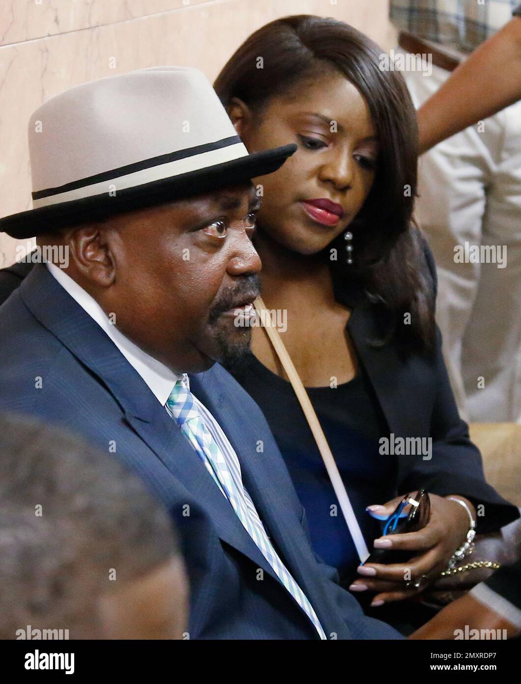 The Rev. Joey Crutcher, left, the father of Terence Crutcher, and his ...