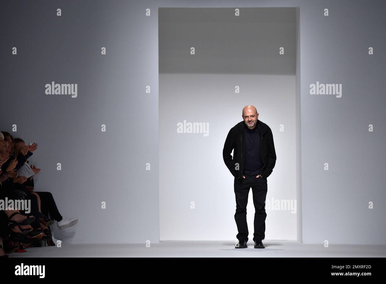 Fashion designer Hussein Chalayan ackowledges applauses after the ...
