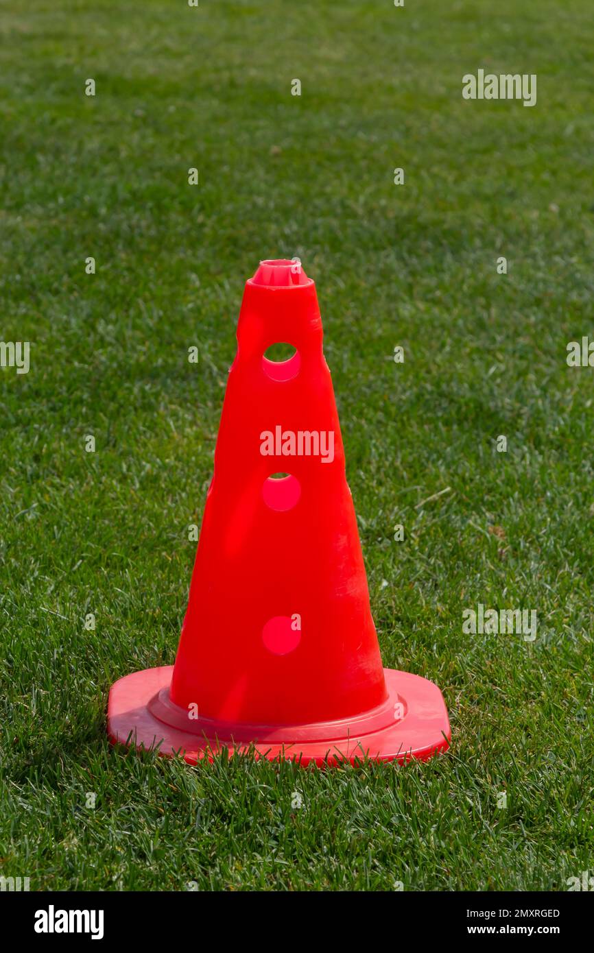 Plastic chips and cone for football training. Sports playground with ...