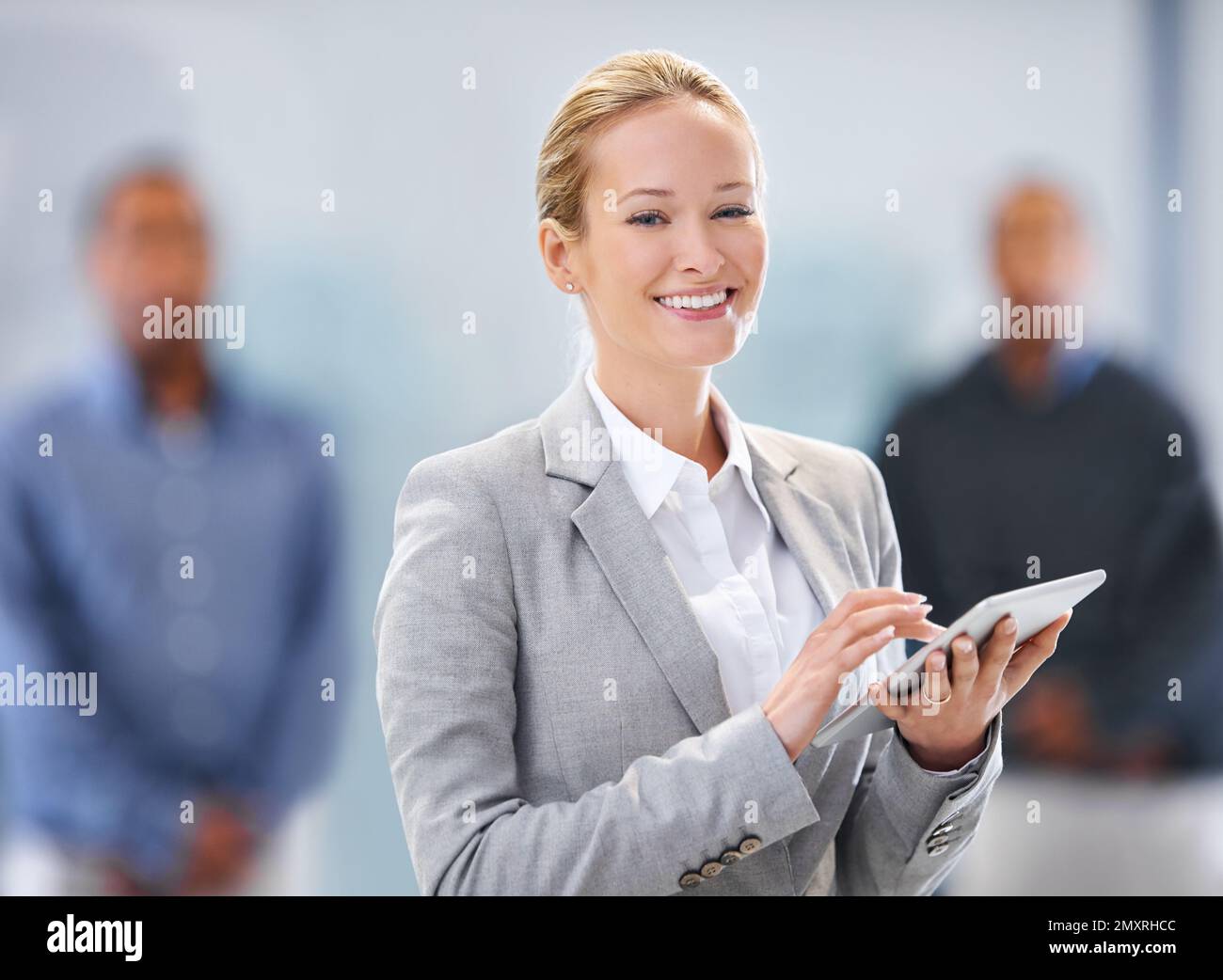 She never misses a thing. Portrait of a female factory manager standing ...