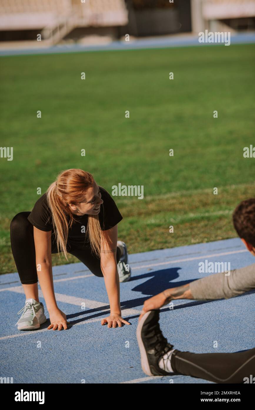 Smiley sportspeople hi-res stock photography and images - Alamy