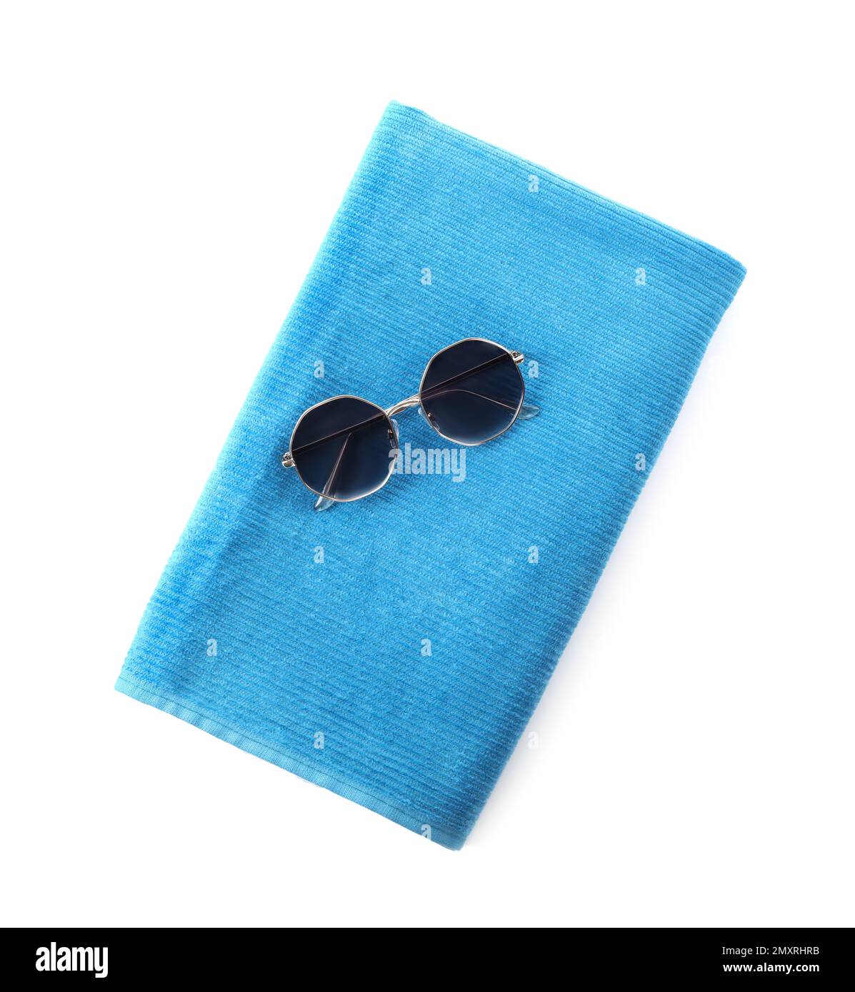 Blue towel and sunglasses on white background, top view. Beach objects ...