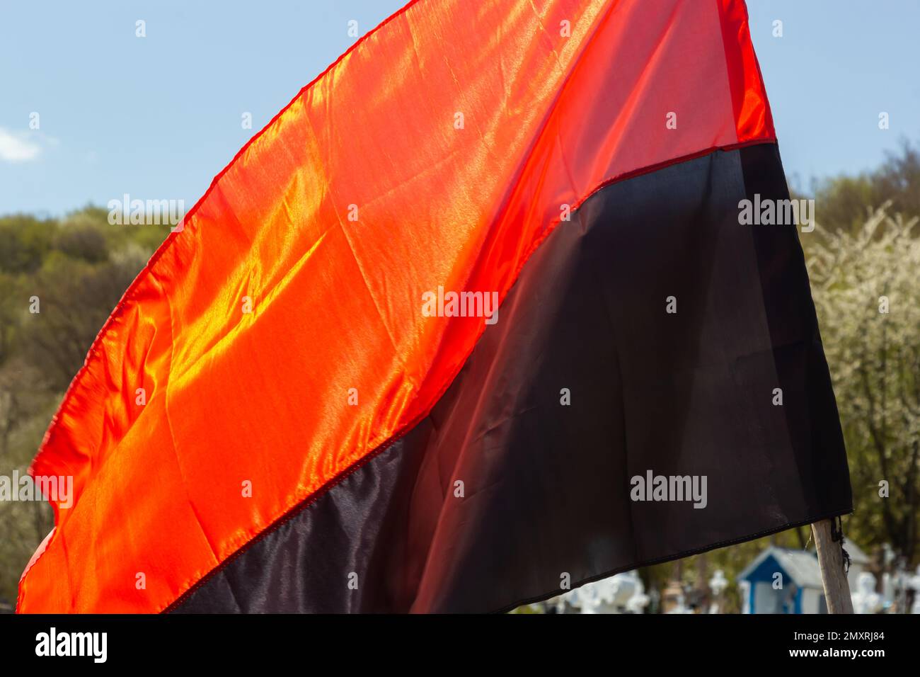 Red-black flag of the Right Sector in Ukraine, isolated against the ...