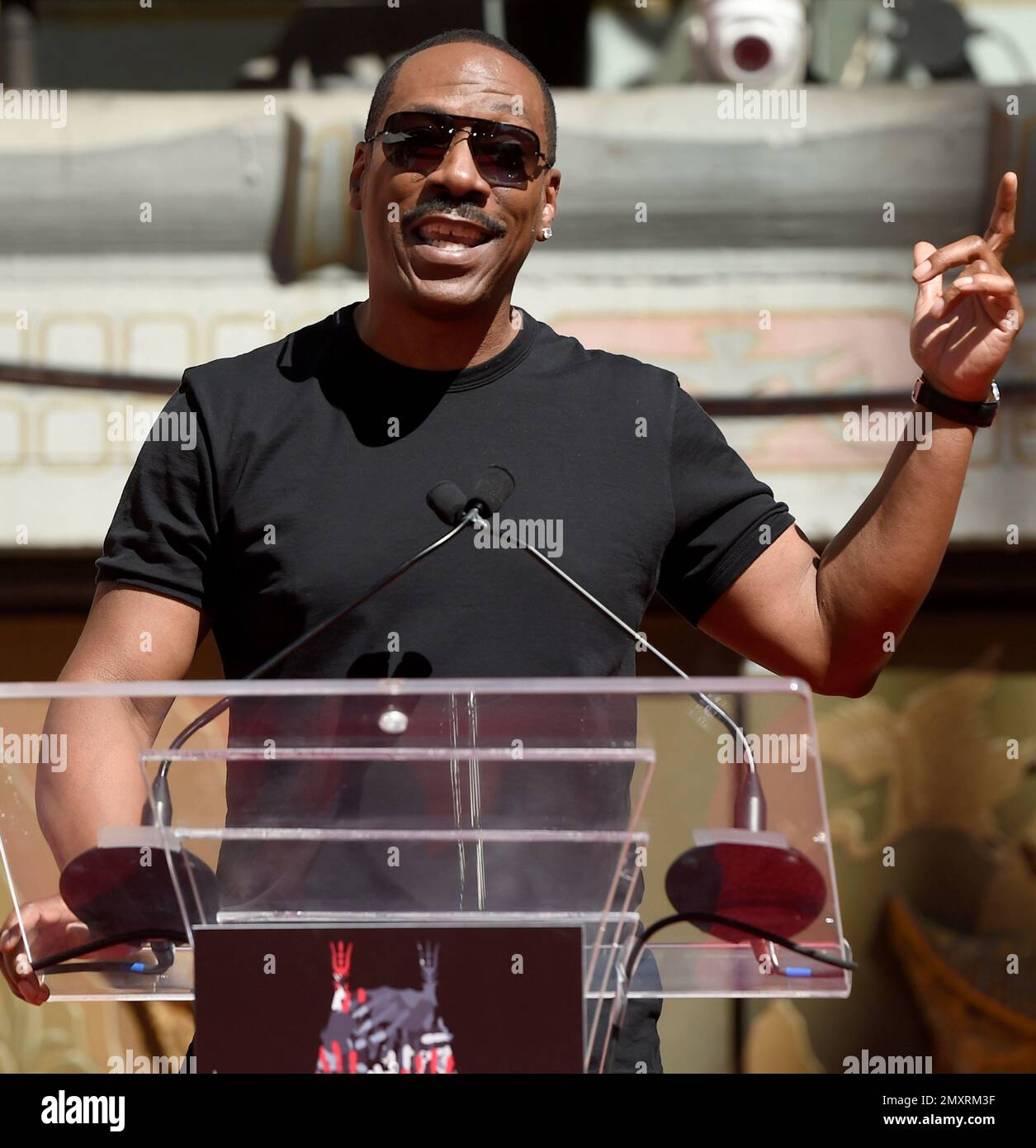 Eddie Murphy speaks at the hand and footprint ceremony for DreamWorks ...