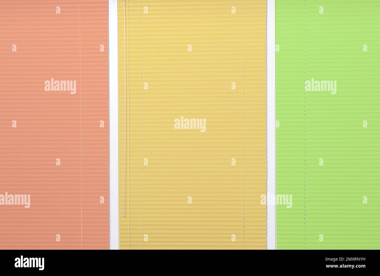 Window with closed multicolor blinds as background Stock Photo - Alamy