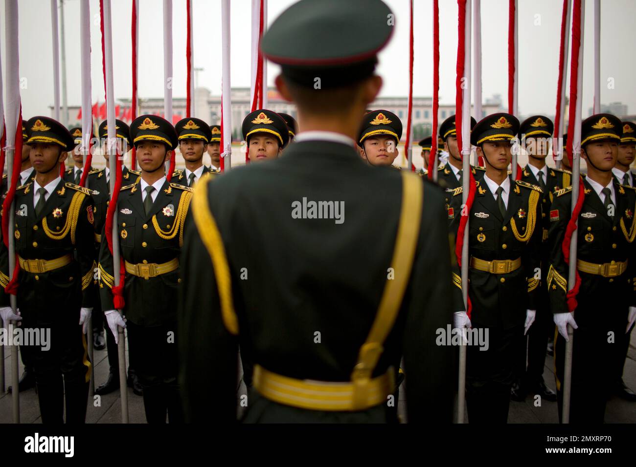 Members of a Chinese honor guard line up in formation before a welcome ...