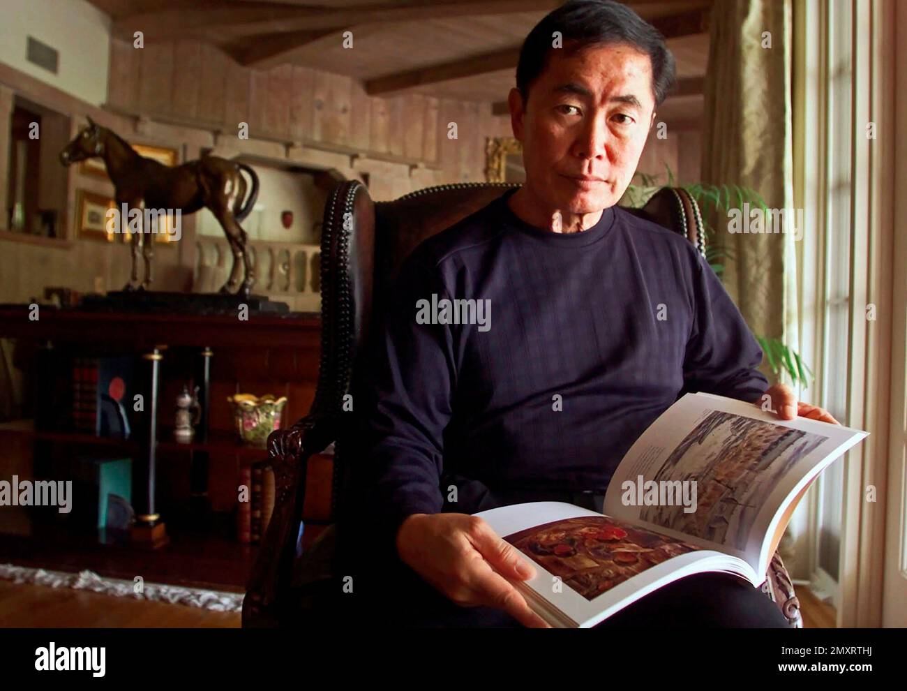 FILE - In this July 30, 2001, file photo, actor George Takei looks at a ...