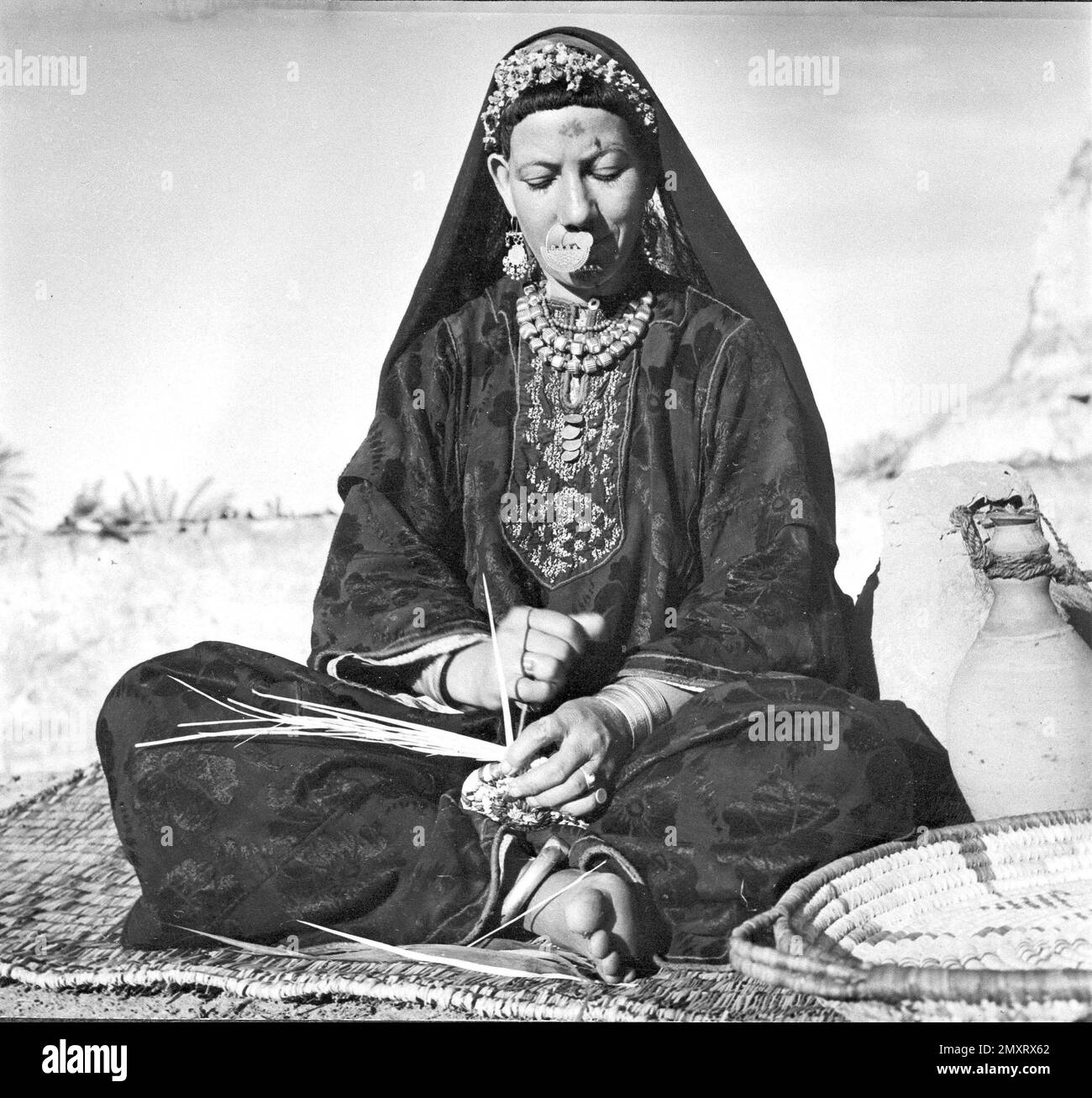 A woman who is member of one of the nomadic tribes that have long lived ...