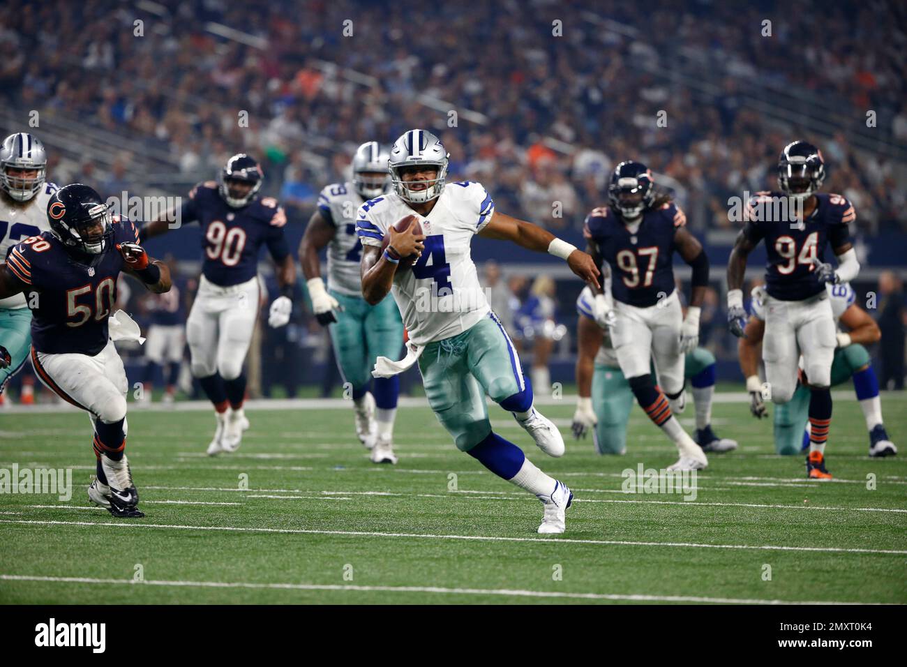 Dallas Cowboys quarterback Dak Prescott (4) carries the ball as Chicago ...