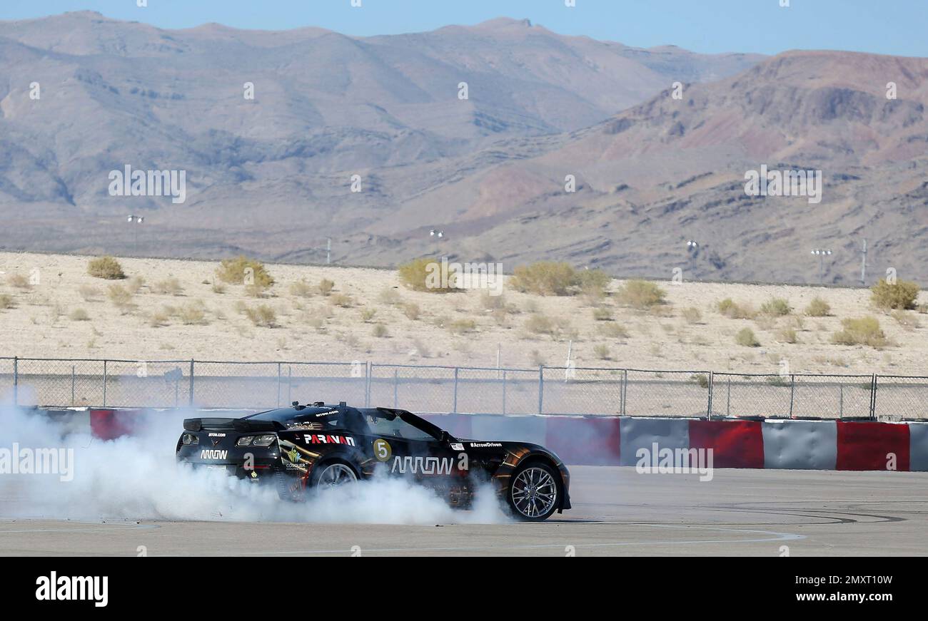 Indy Racing League driver Sam Schmidt roasts the tires in his modified ...