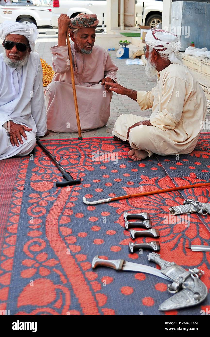 Khanjars on display at the gun market in Nizwa, Oman - Men in ...