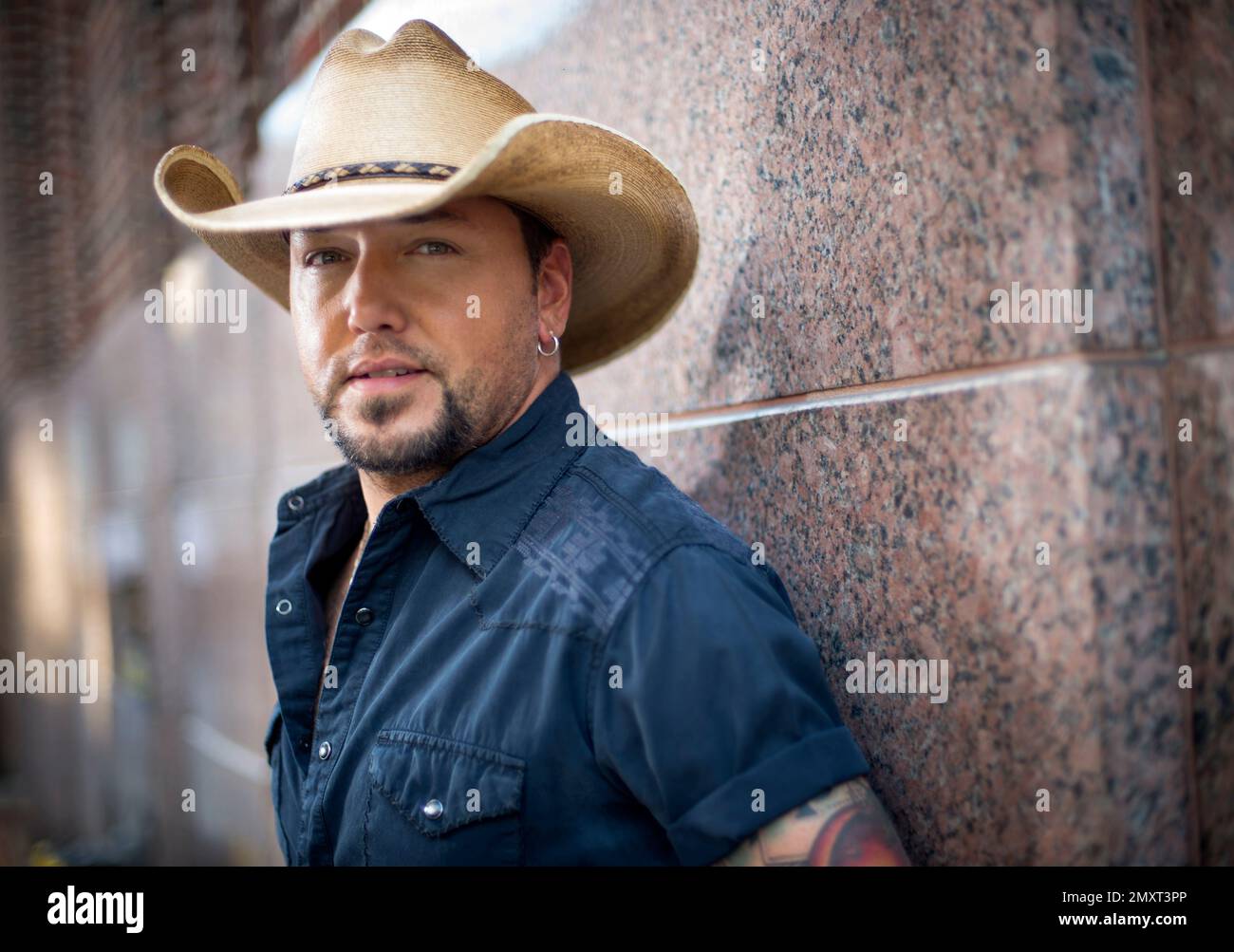 In this Sept. 8, 2016 photo, country singer Jason Aldean poses for a ...