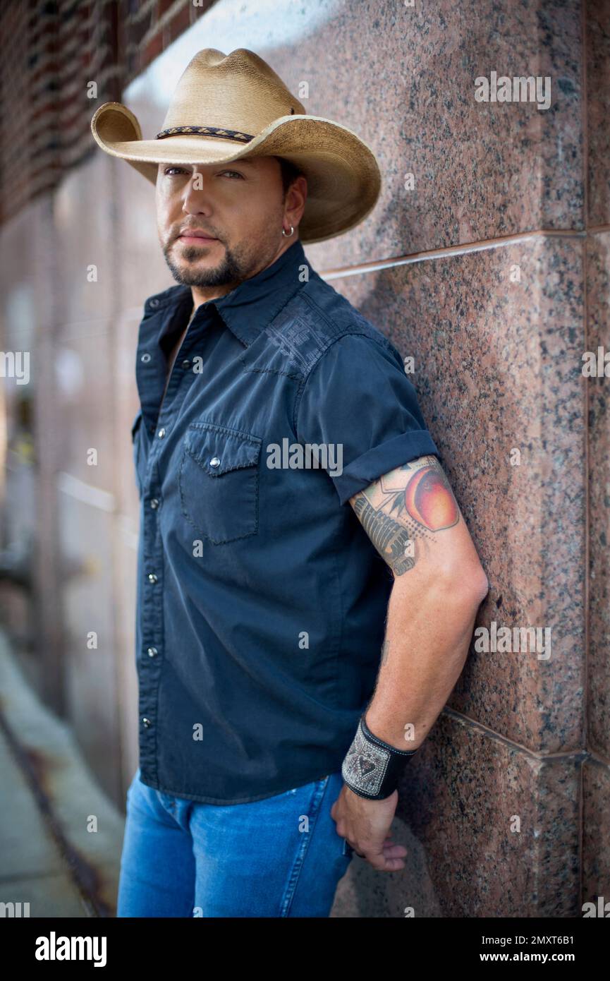 In this Sept. 8, 2016 photo, country singer Jason Aldean poses for a ...