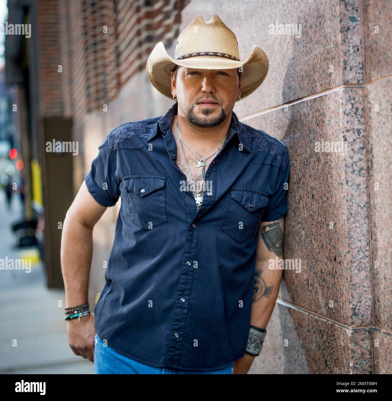 In this Sept. 8, 2016 photo, country singer Jason Aldean poses for a ...