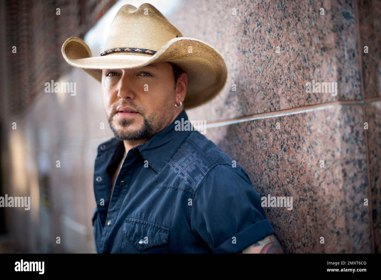 In this Sept. 8, 2016 photo, country singer Jason Aldean poses for a ...