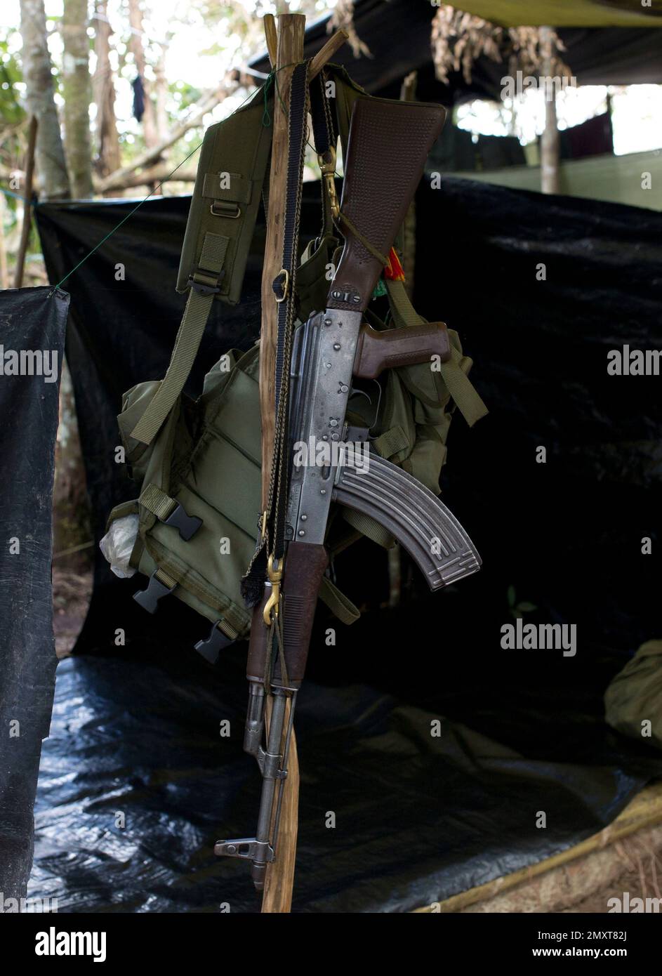 The weapon of a rebel of the Revolutionary Armed Forces of Colombia ...