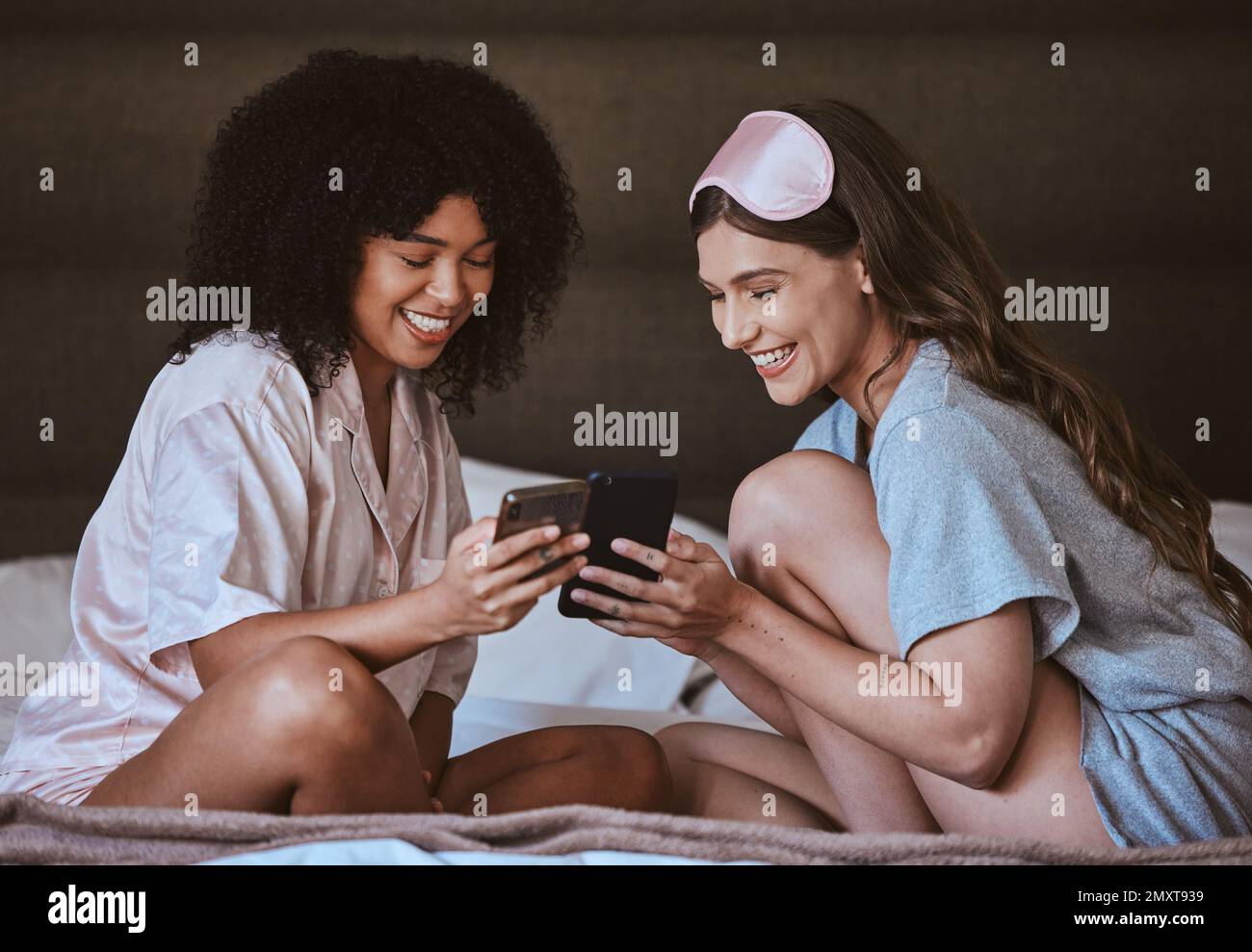 Woman, friends and phone on bed with smile for social media, networking ...