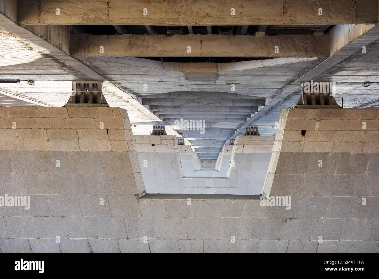 The lower abutments of the gray bridge are directed towards the ...