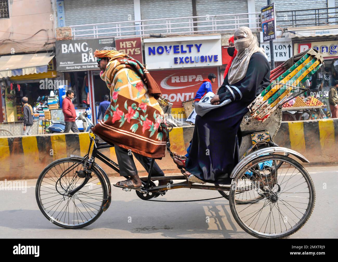 INDIA. UTTARPRADESH. VARANASI. (BENARES) MUSLIM WOMEN ON A RICKSHAW ...