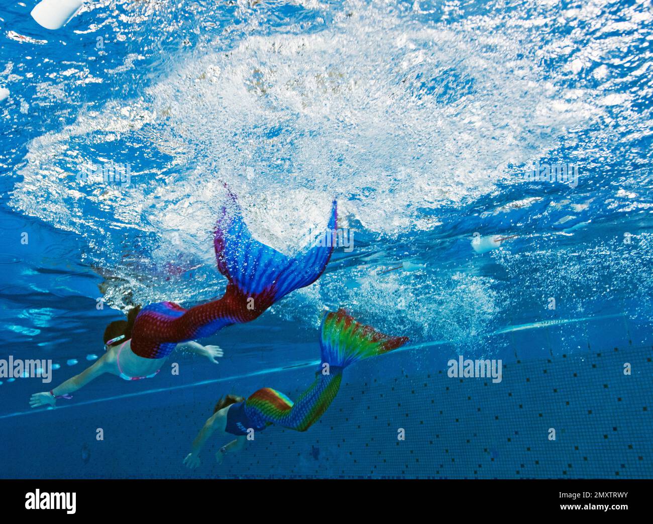 Children swim during the German Championships in Mermaid swimming in ...