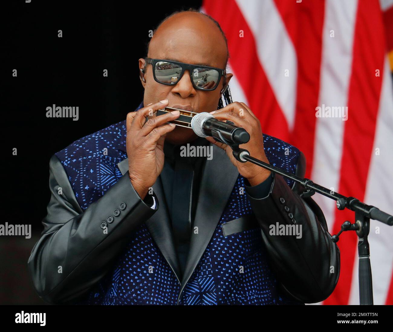 Singer Stevie Wonder performs at the dedication ceremony for the ...