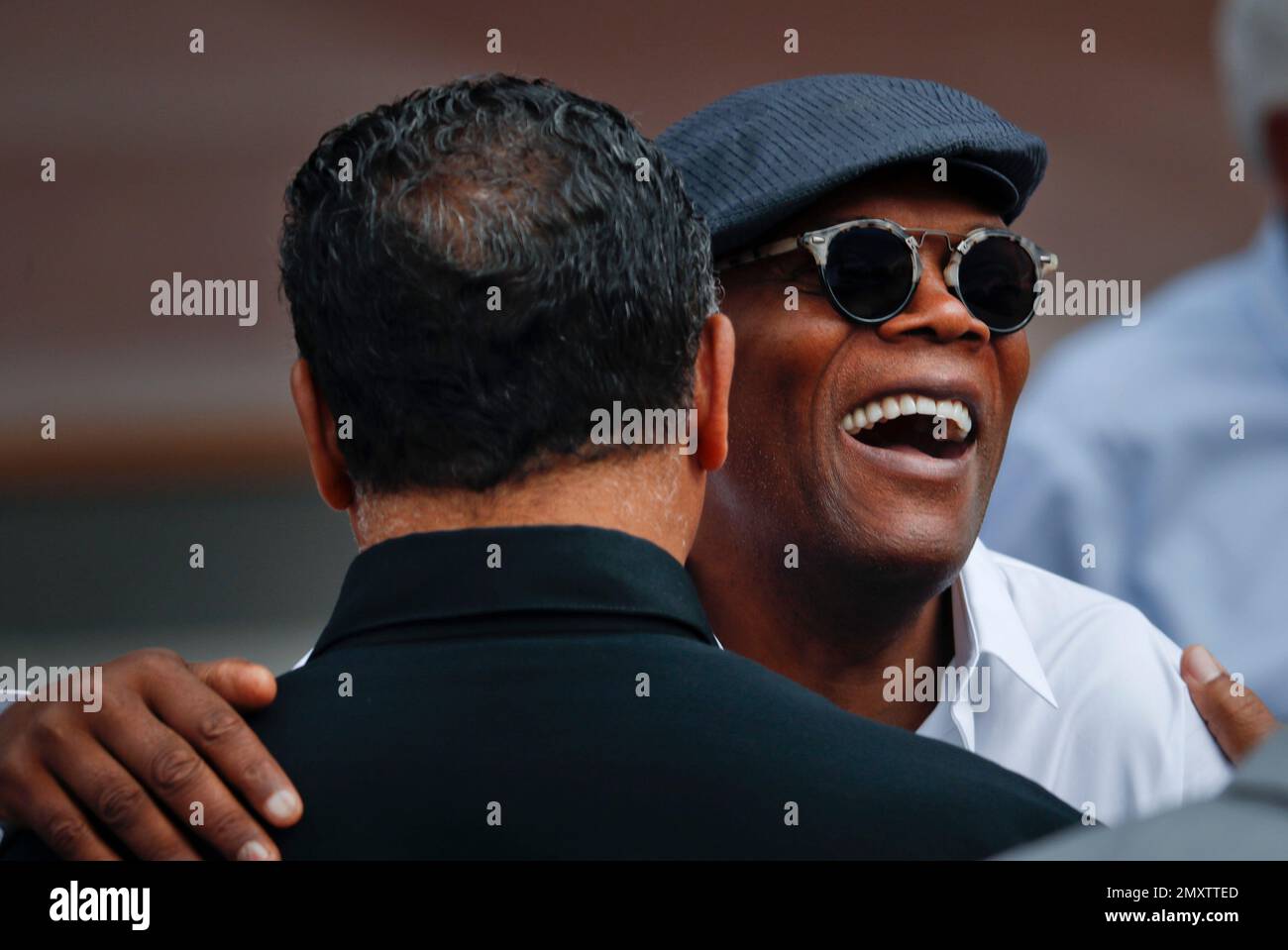 Actor Samuel Jackson, right, greets Rev. Jesse Jackson Sr. as they take ...