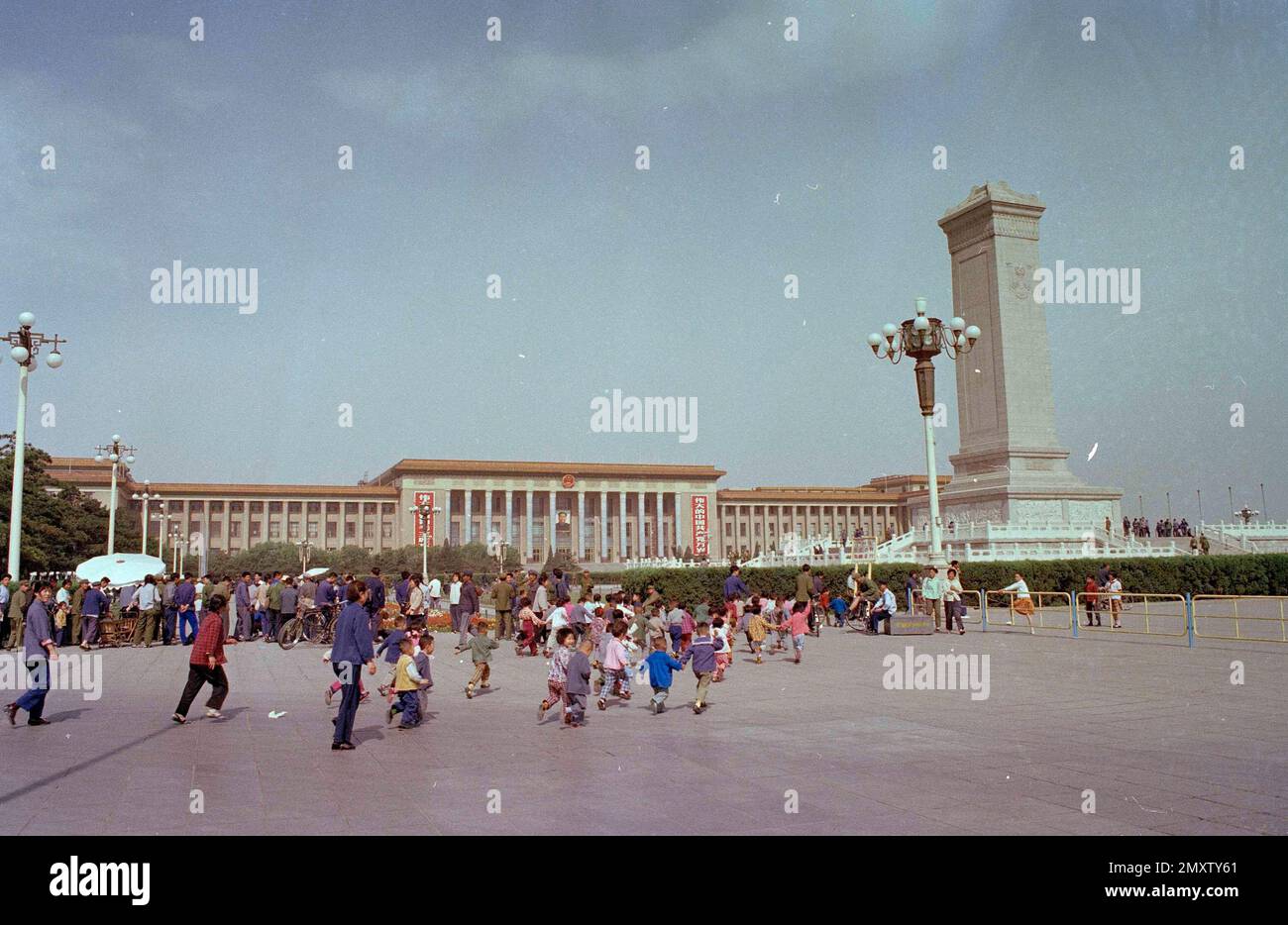 The Great Hall of the People, left, and Matryr's Monument, right, in ...
