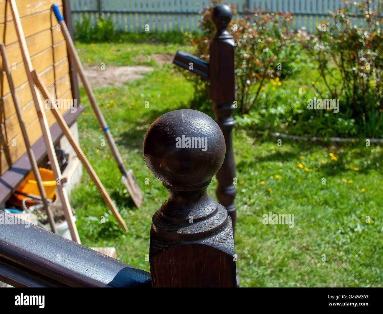 wooden fences of the village veranda, in spring Stock Photo - Alamy
