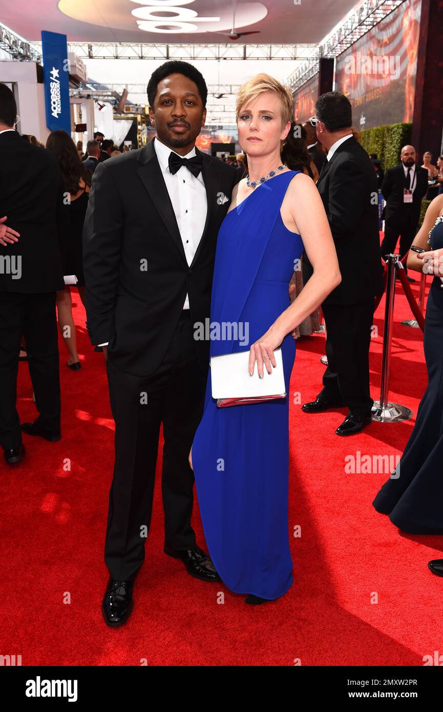 Joe Robert Cole, left, and Polly Cole arrive at the 68th Primetime Emmy Awards on Sunday, Sept ...