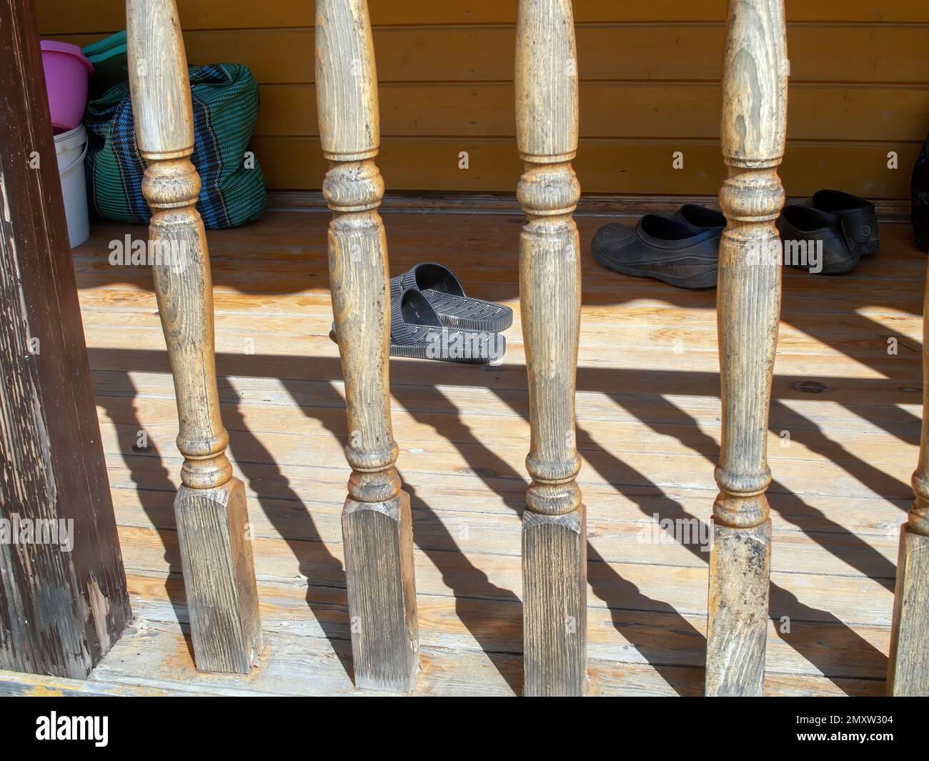 wooden fences of the village veranda, in spring Stock Photo - Alamy