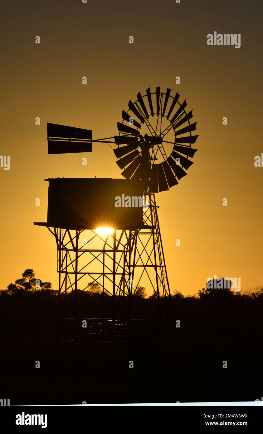 Windmill and Tank Stock Photo - Alamy