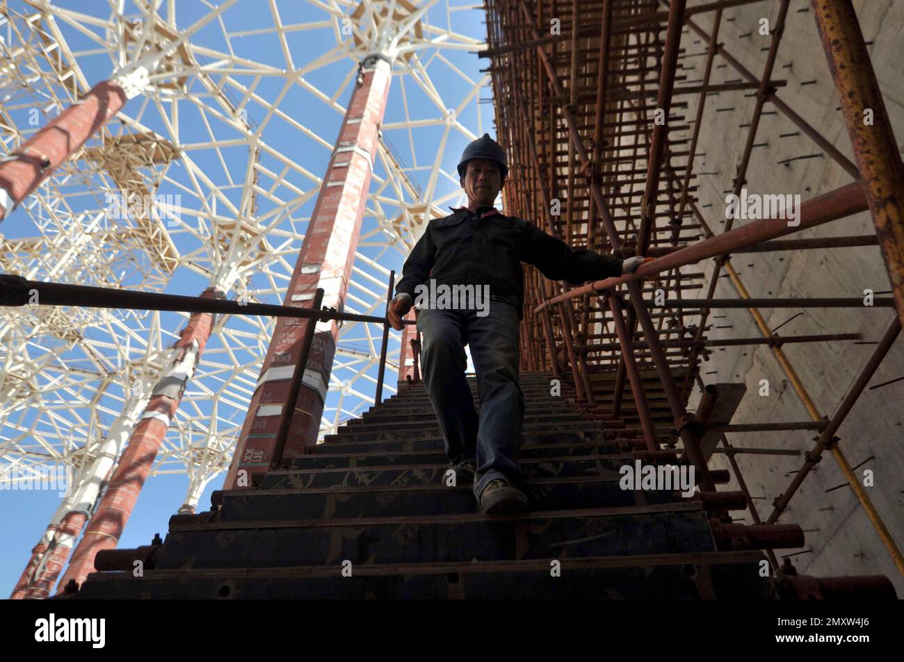 A worker is pictured in the Grand Mosque of Algiers under construction ...