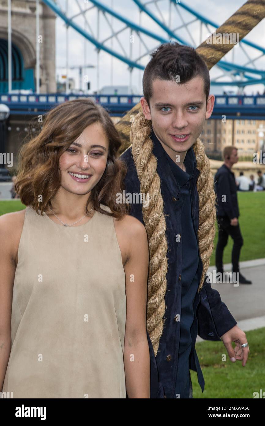 Actors Ella Purnell, left, and Asa Butterfield pose for photographers ...