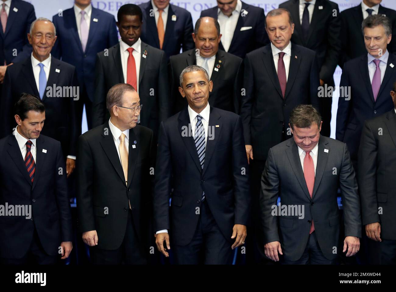 President Barack Obama participates in the Refugee Summit family photo ...