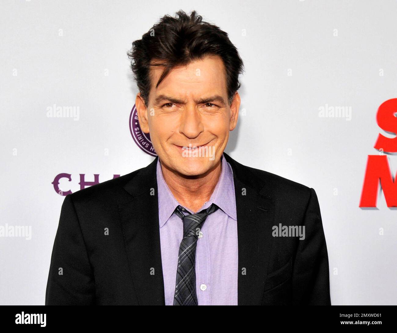 FILE - In this April 11, 2013 file photo, Charlie Sheen, a cast member ...