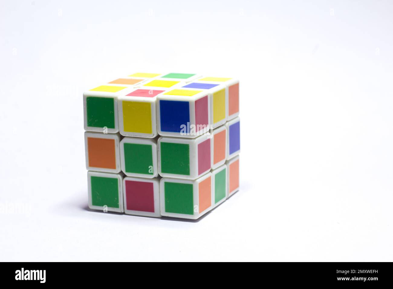 A Rubik's cube on a white background with copy space Stock Photo - Alamy