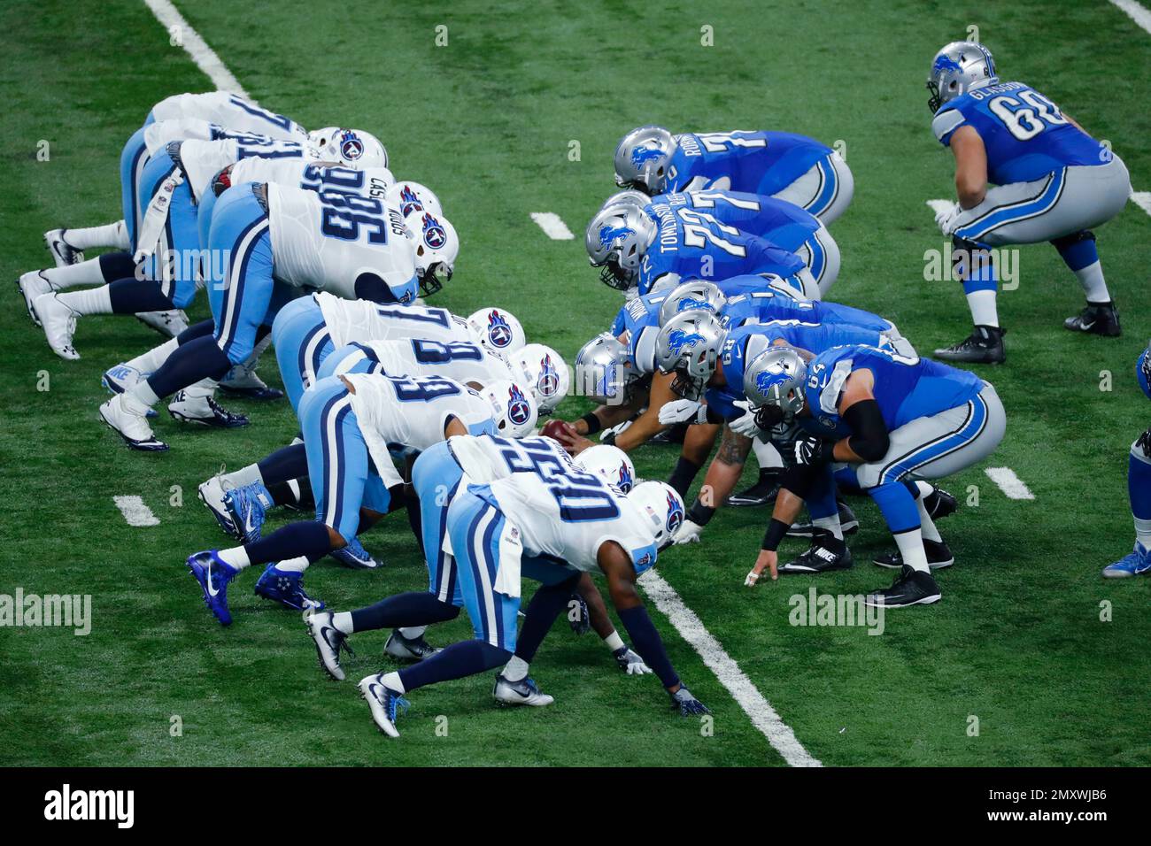 Detroit Lions and Tennessee Titans line up at the line of scrimmage ...