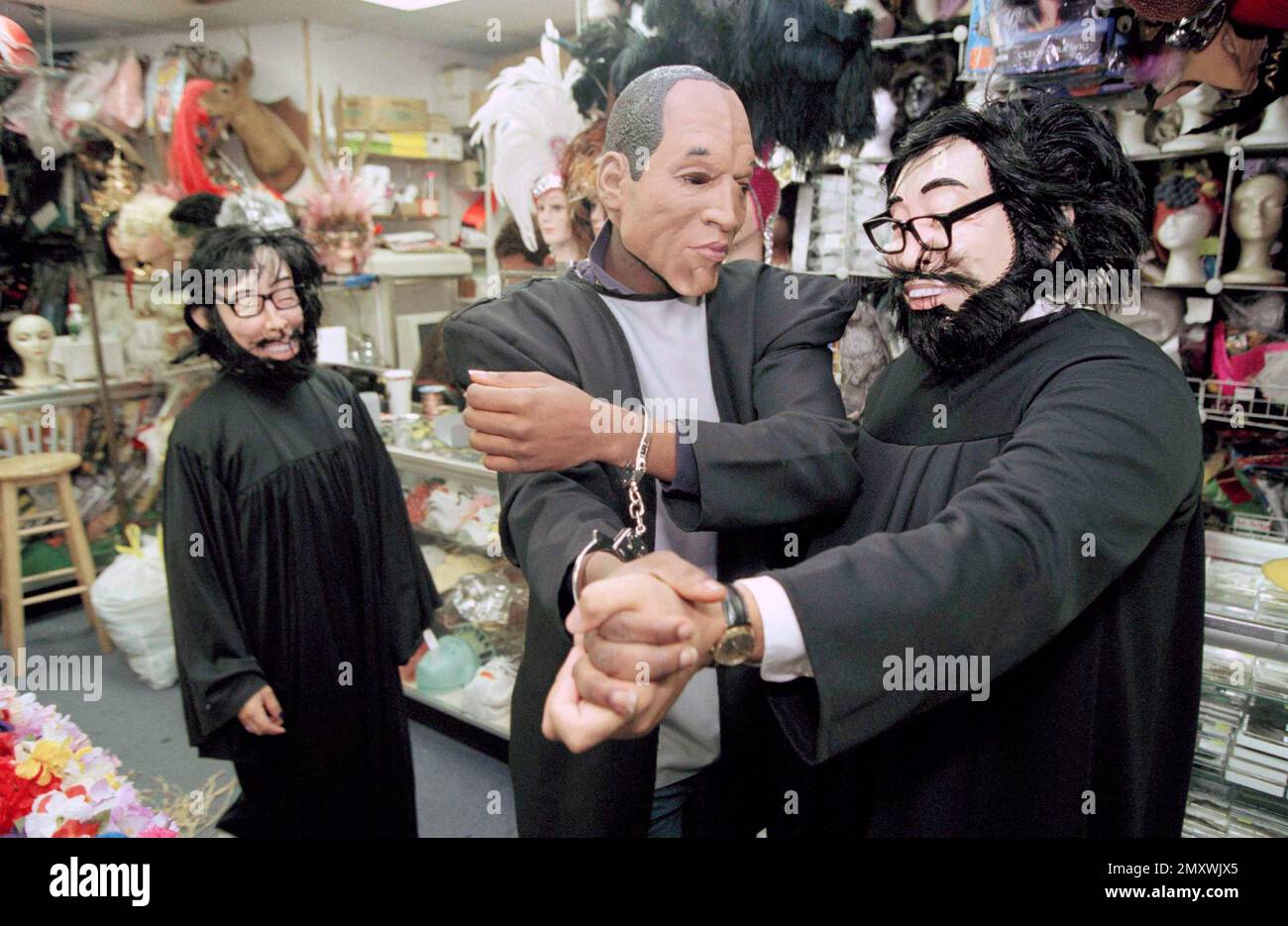 Revelers wearing Judge Ito and O.J. Simpson masks, tow of the most ...